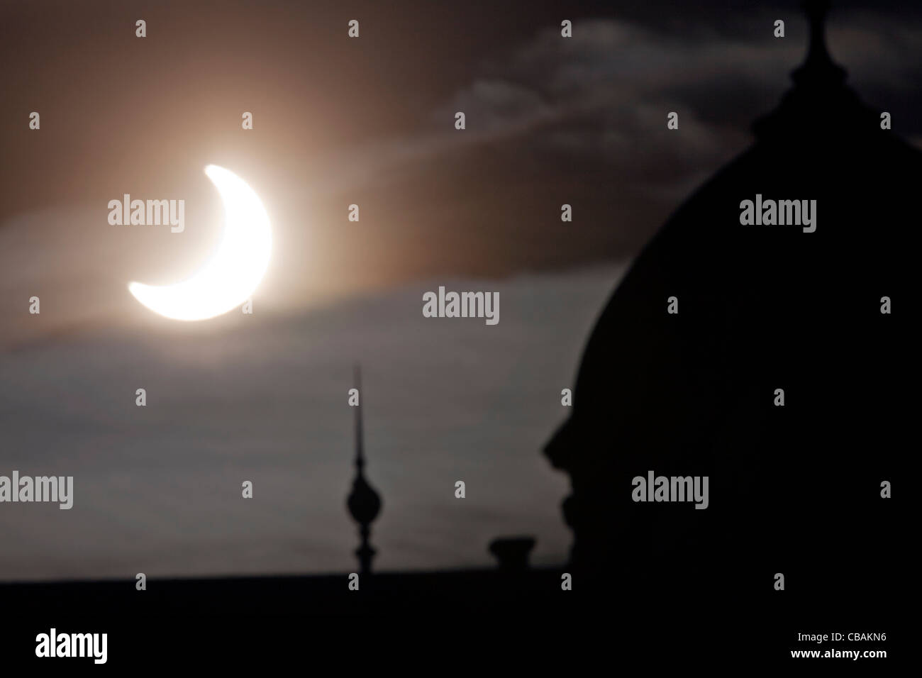 A view of a partial solar eclipse as seen from Prague, Czech Republic ...