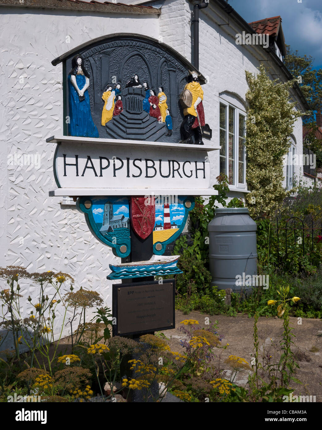The Happisburgh village sign Stock Photo - Alamy