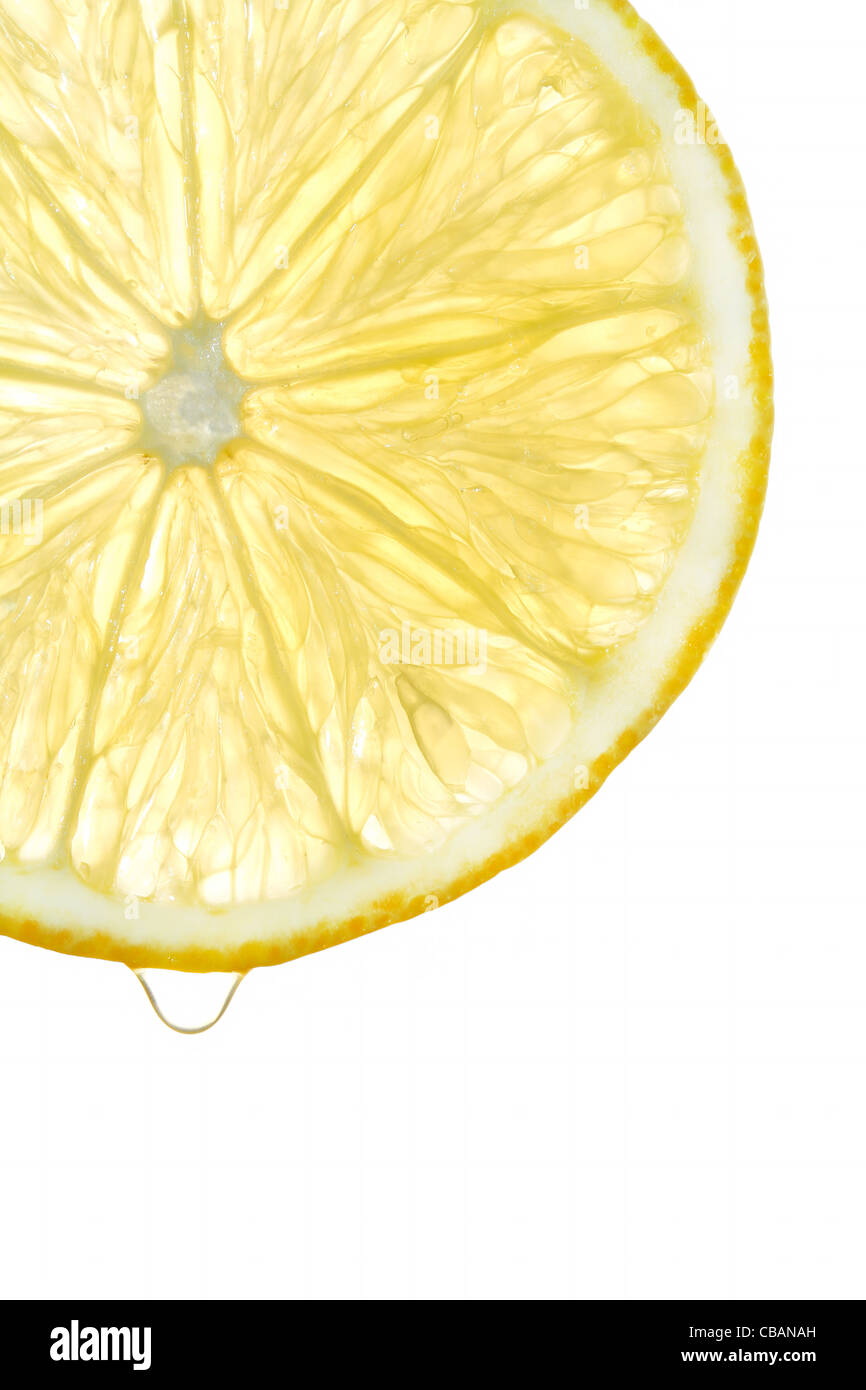 Juicy fresh lemon slice with white background Stock Photo - Alamy