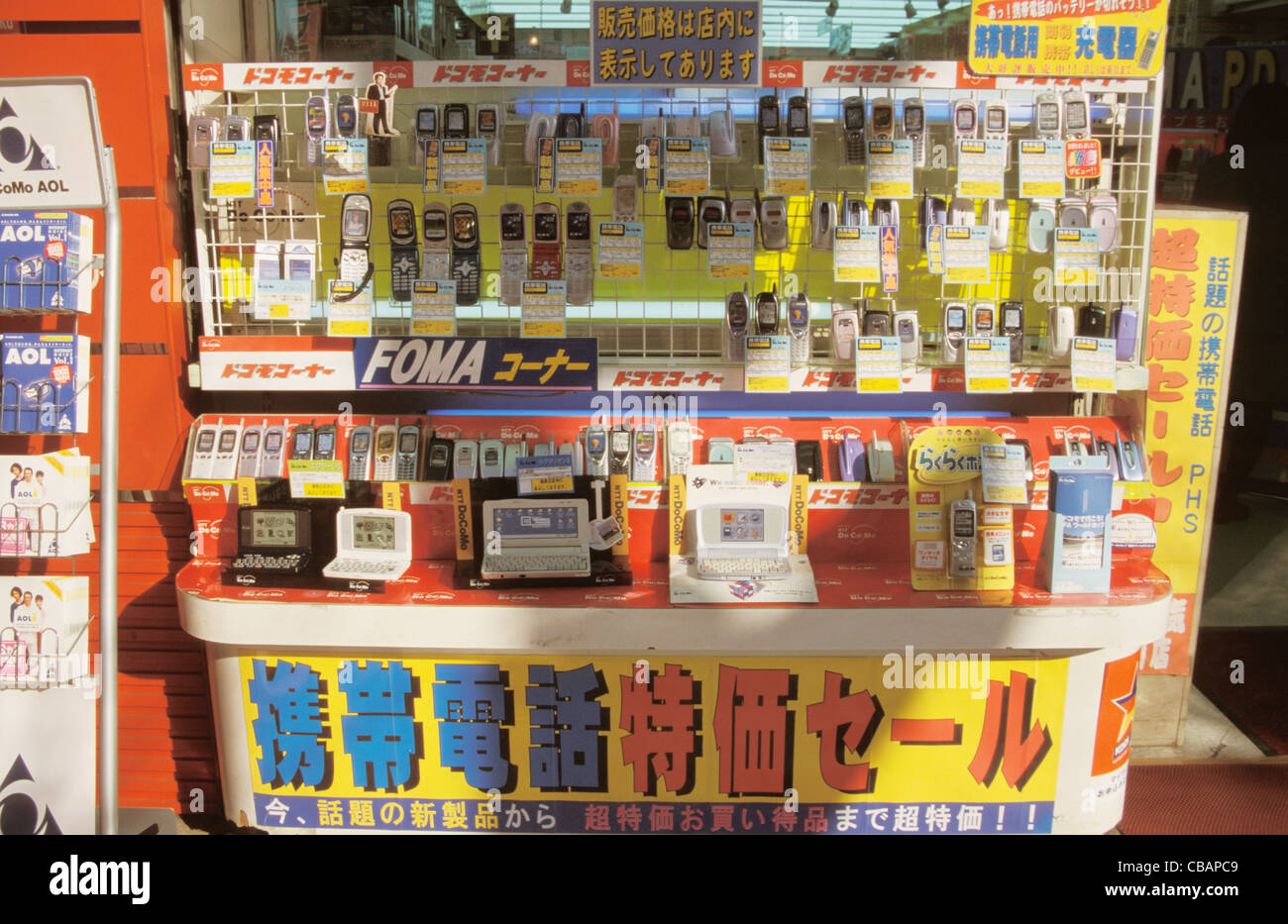 Akihabara Japan Tokyo Mobile telephones and pocket computers on display ...