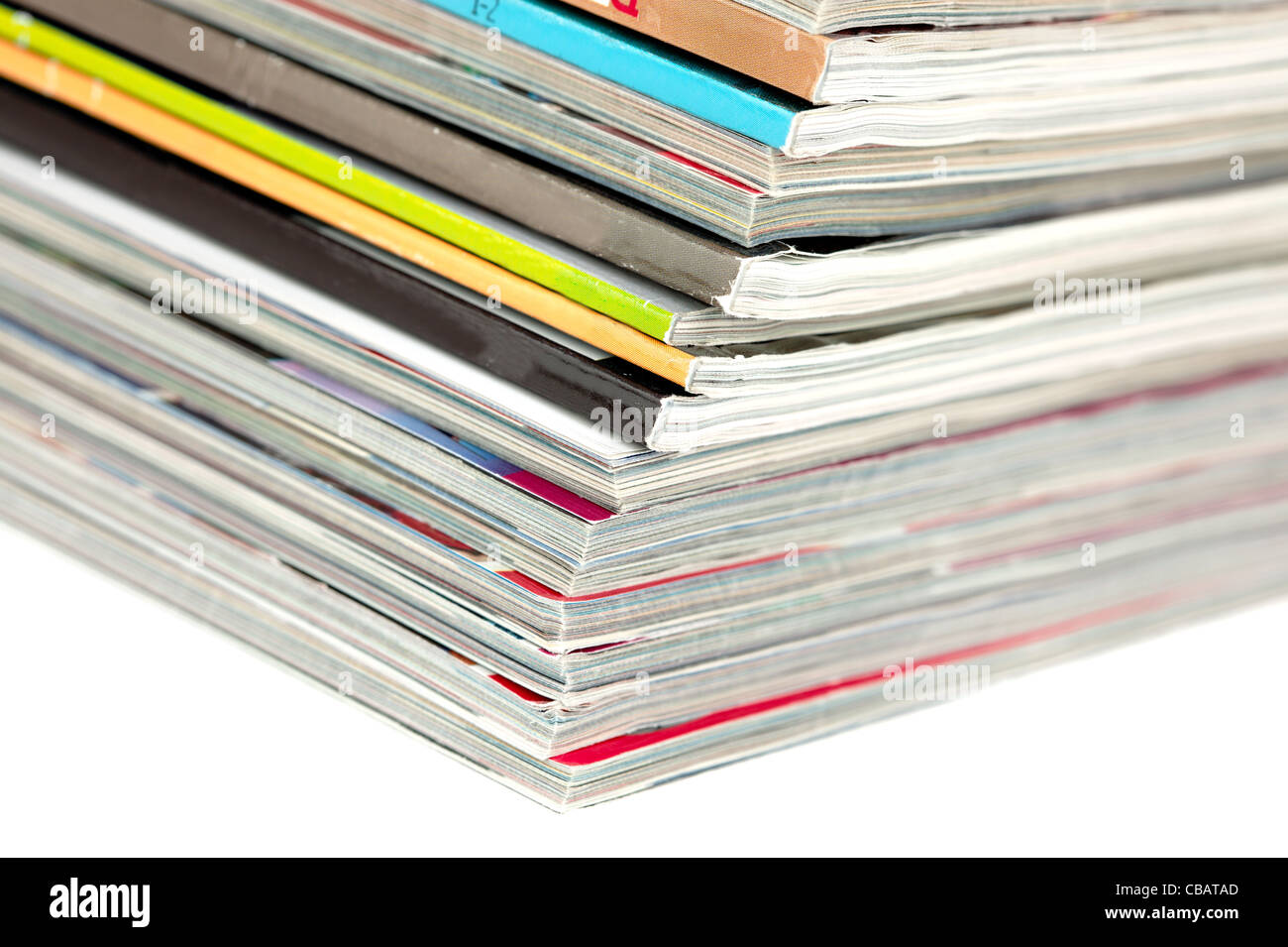 Stack of magazines isolated on white Stock Photo - Alamy