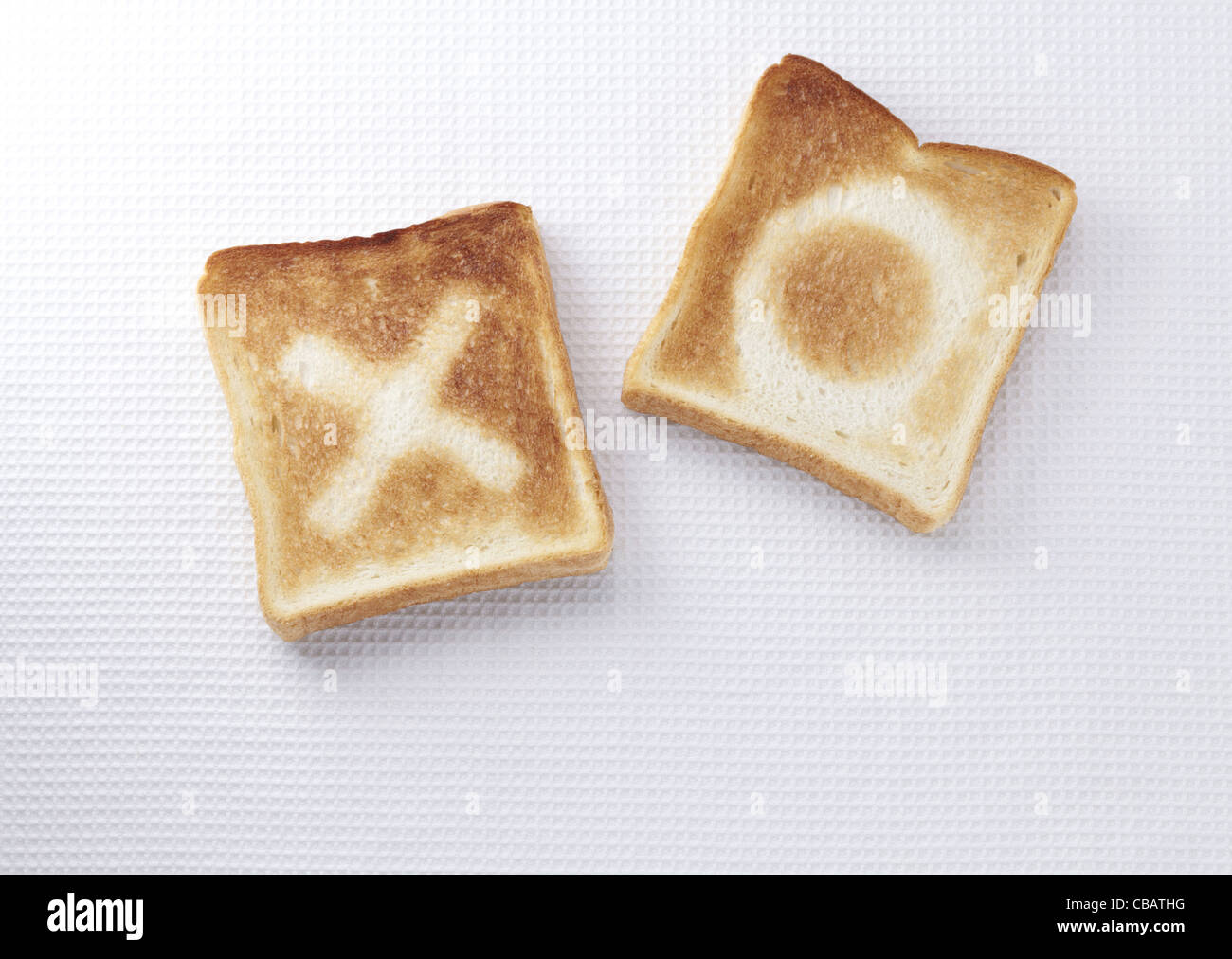 Cross and circle sign on toasts Stock Photo - Alamy