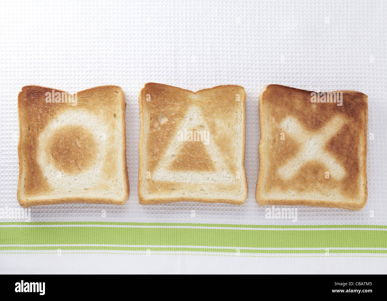 Circle, triangular, and cross sign on toasts Stock Photo - Alamy