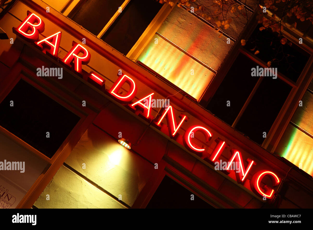 A neon sign for Bar-Dancing Stock Photo - Alamy
