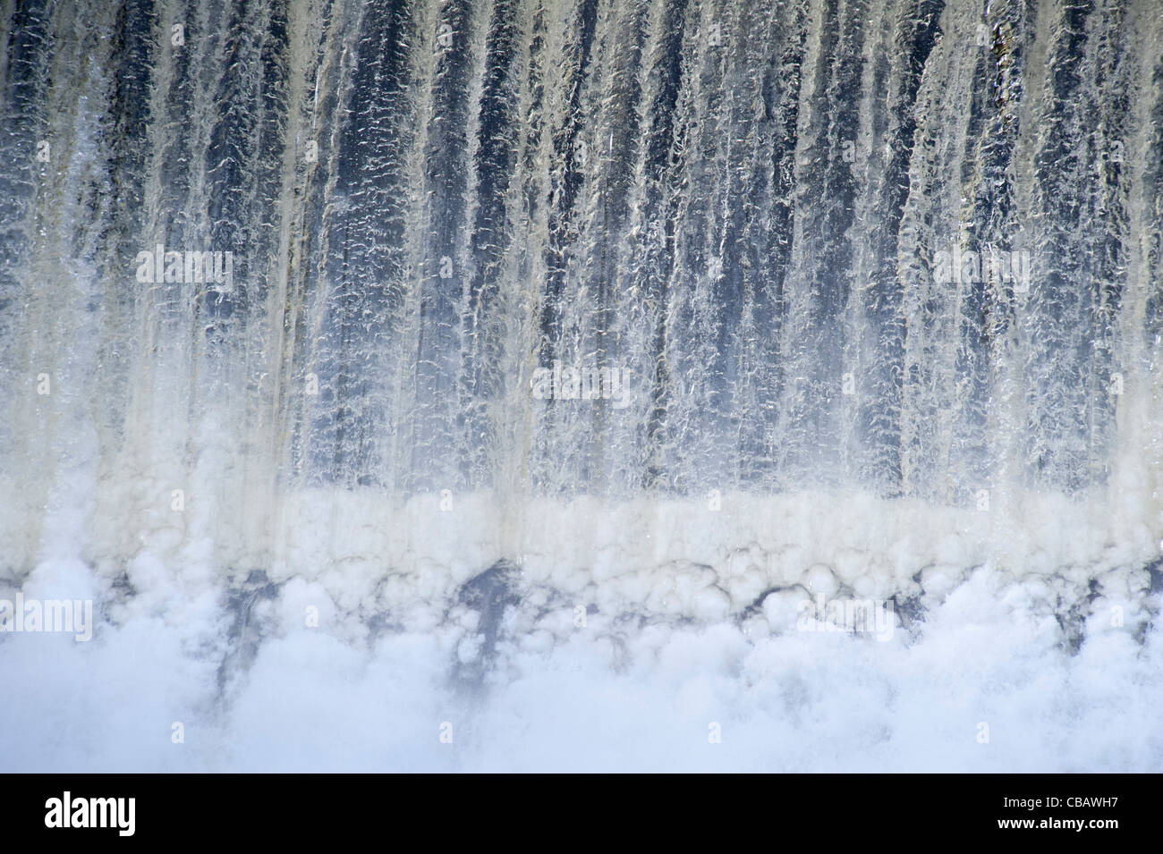 water flowing over dam Stock Photo - Alamy