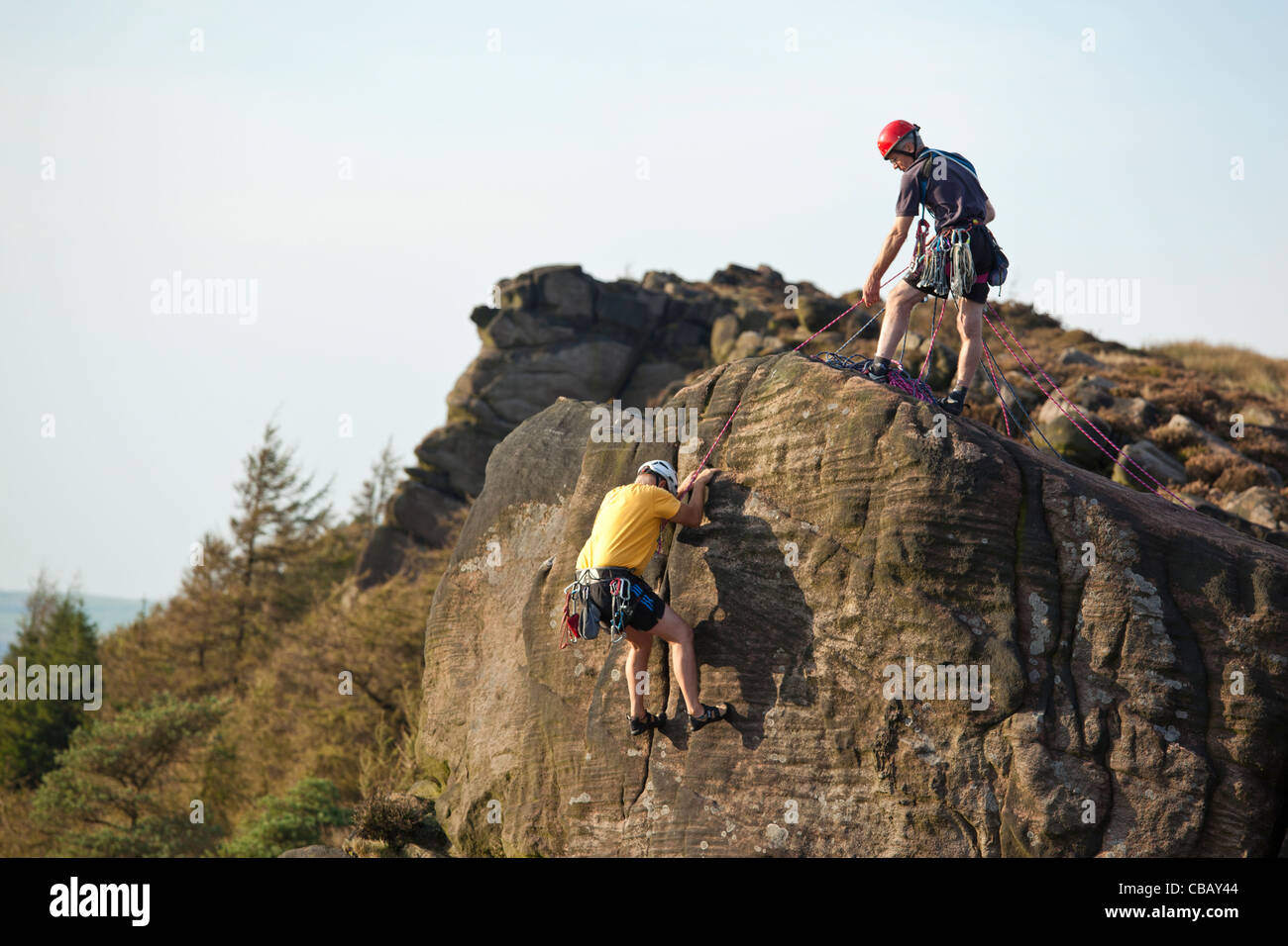 rock-climbers-tackling-the-gritstone-escarpment-of-the-roaches-in-the