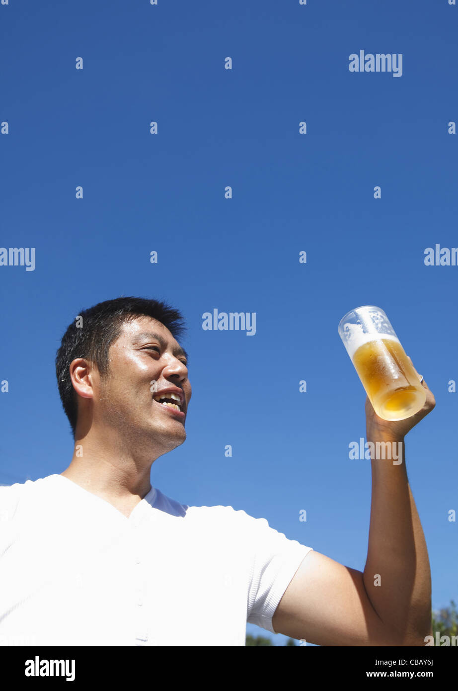 Man drinking beer Stock Photo - Alamy