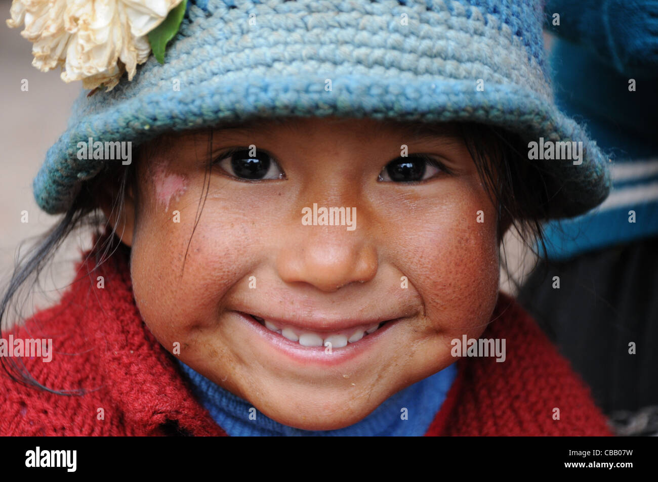 PERUVIAN CHILD INT HE MARKET LOOKING VERY HAPPY Stock Photo - Alamy