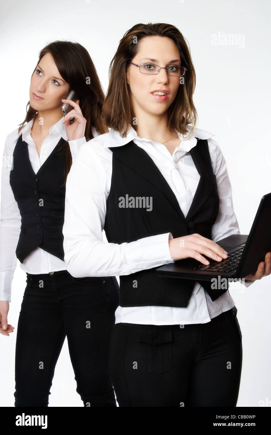 Two girls working Stock Photo - Alamy