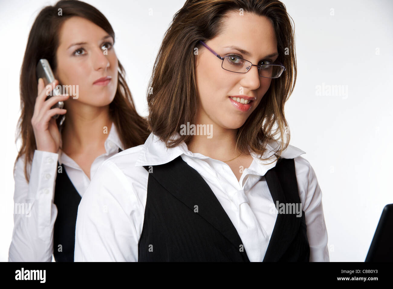 Two girls at work Stock Photo - Alamy