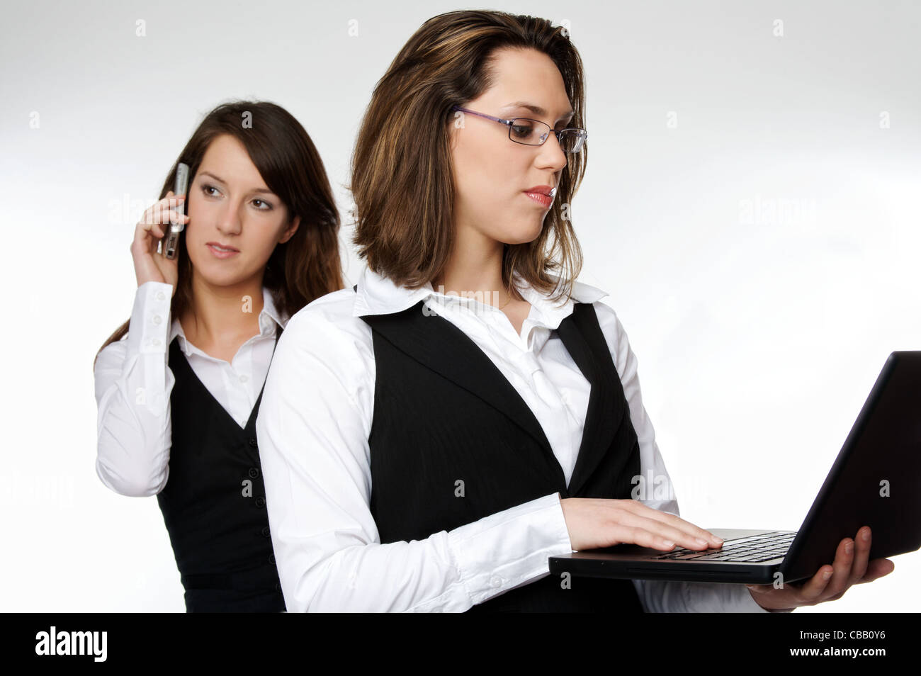 Two girls at work Stock Photo - Alamy