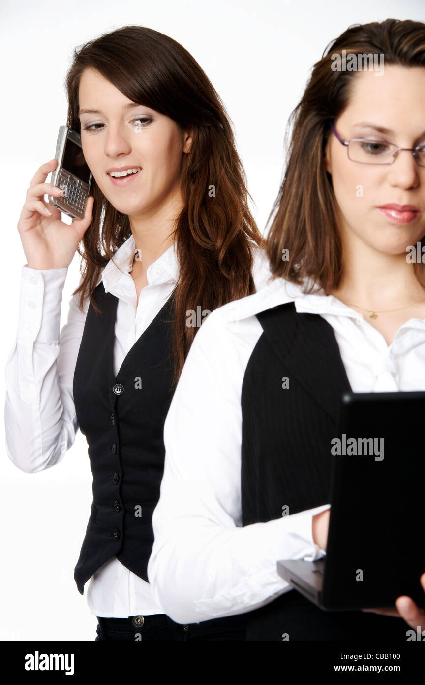 Two girls at work Stock Photo - Alamy
