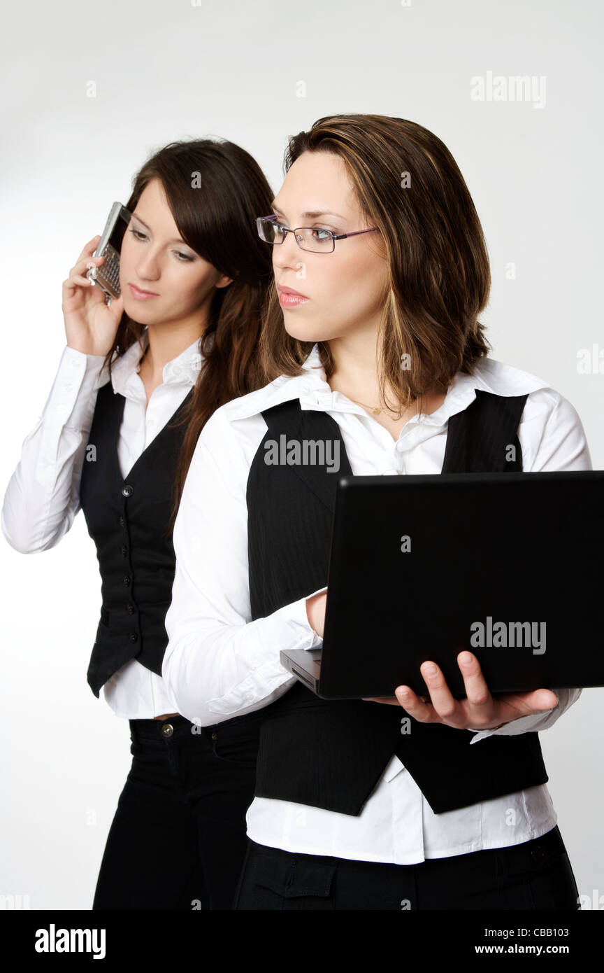 Two girls at work Stock Photo - Alamy