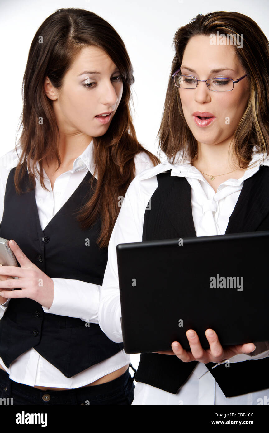 Two girls at work Stock Photo - Alamy