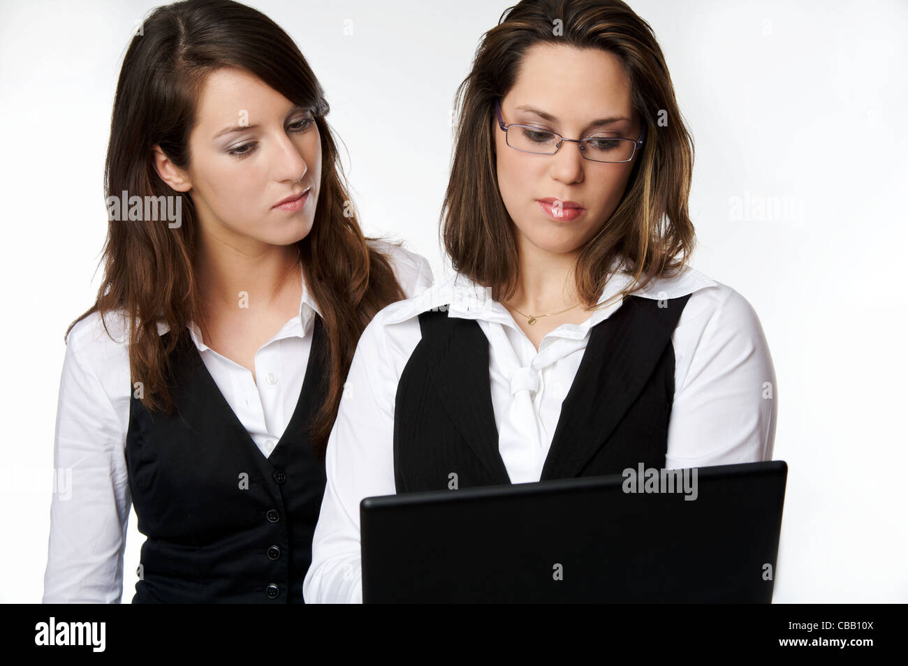 Two girls at work Stock Photo - Alamy