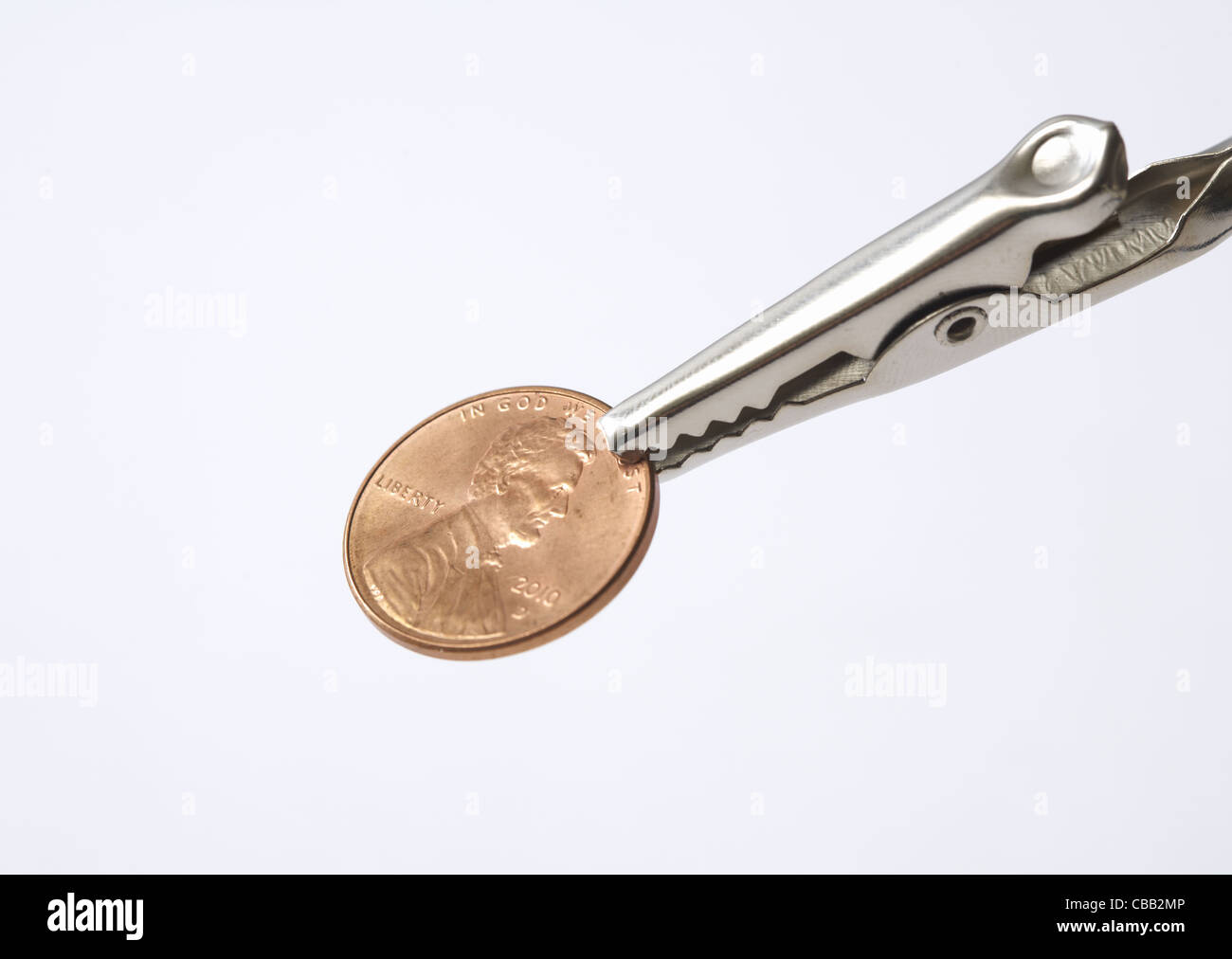 Helping hand holding coin Stock Photo - Alamy