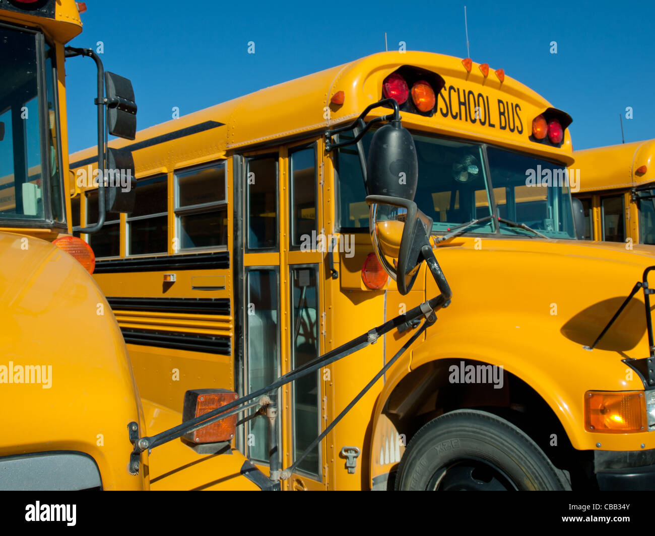 School buses parked near the high school Stock Photo - Alamy