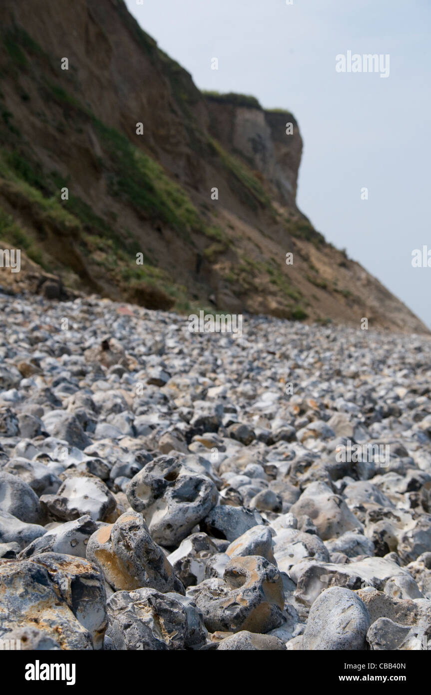 Cromer beach, view from low down of cliff face and pebble beach Stock ...