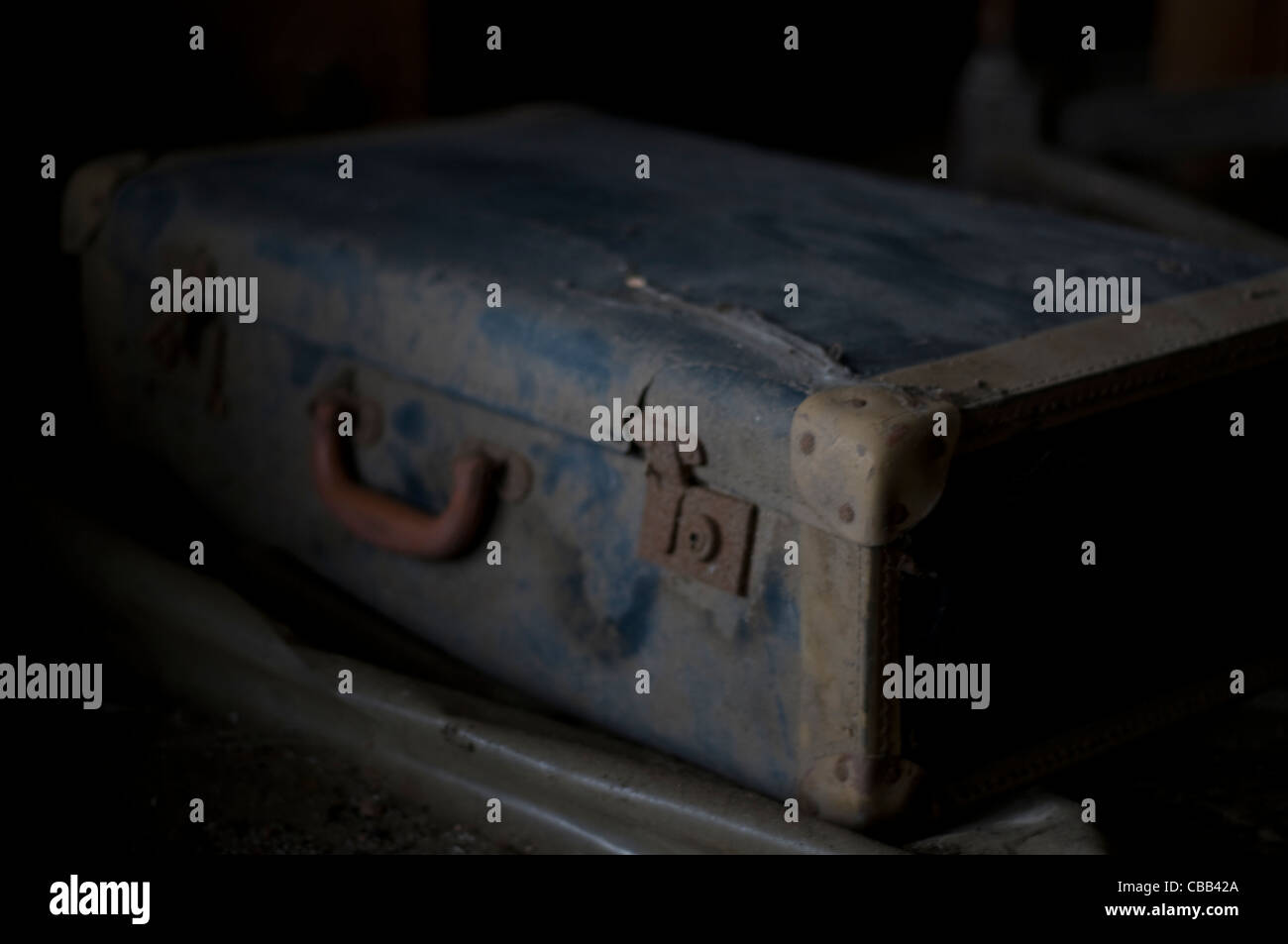 Very old antique vintage blue rusty suitcase Stock Photo - Alamy