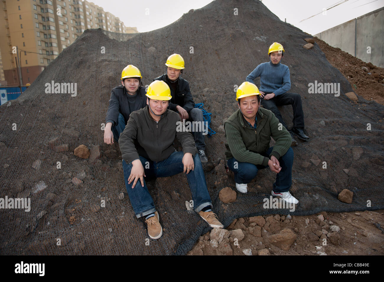 Construction workers having a rest Stock Photo - Alamy