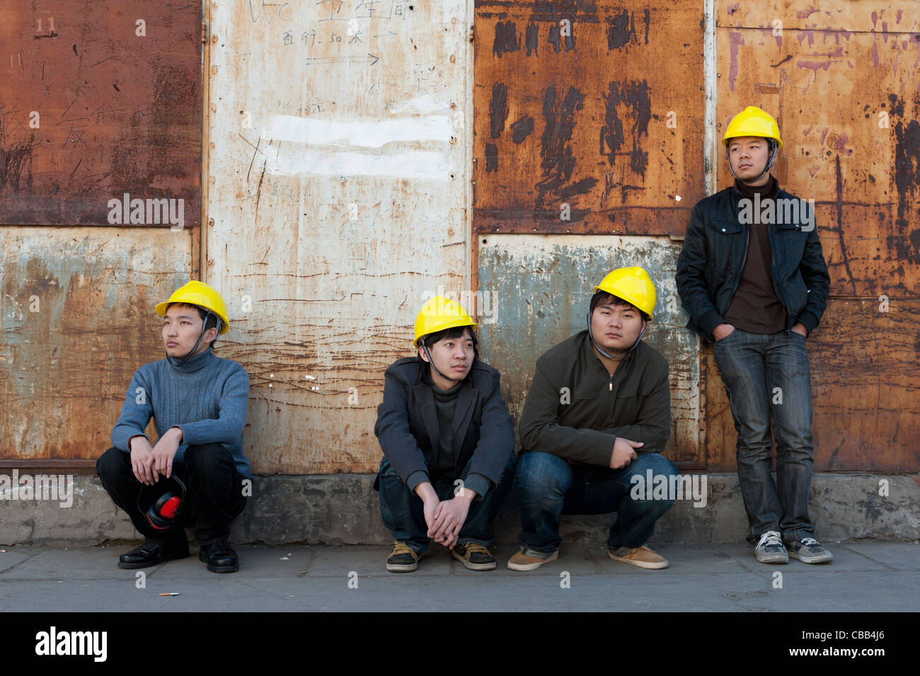 Construction workers having a rest Stock Photo - Alamy