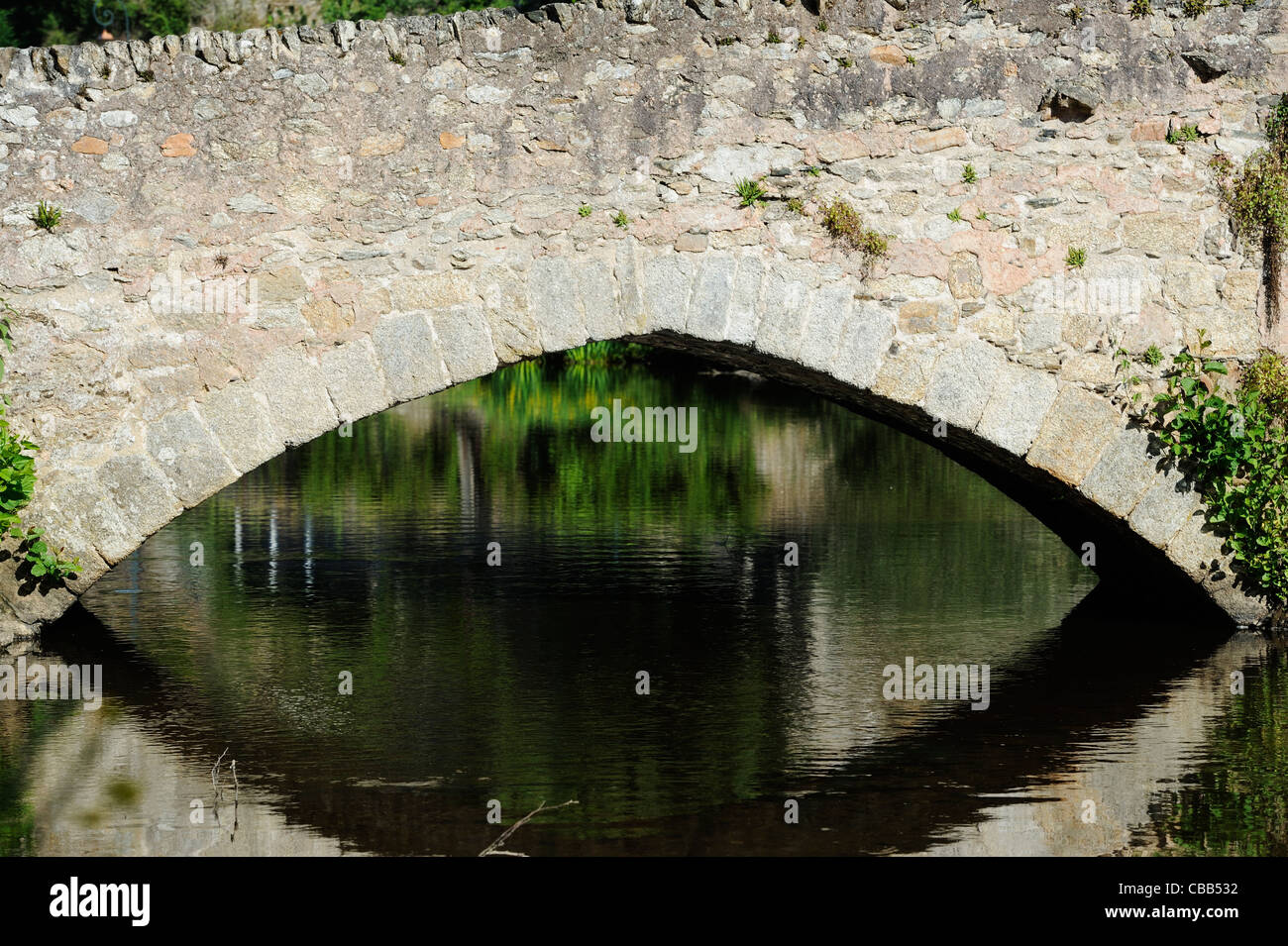 Stock photo of an old stone arched bridge in France Stock Photo - Alamy