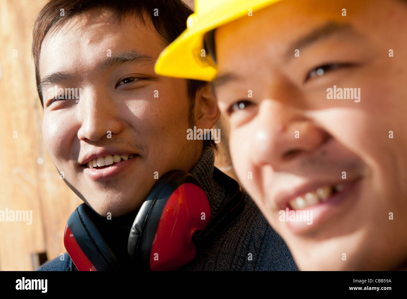 Construction workers chatting Stock Photo - Alamy