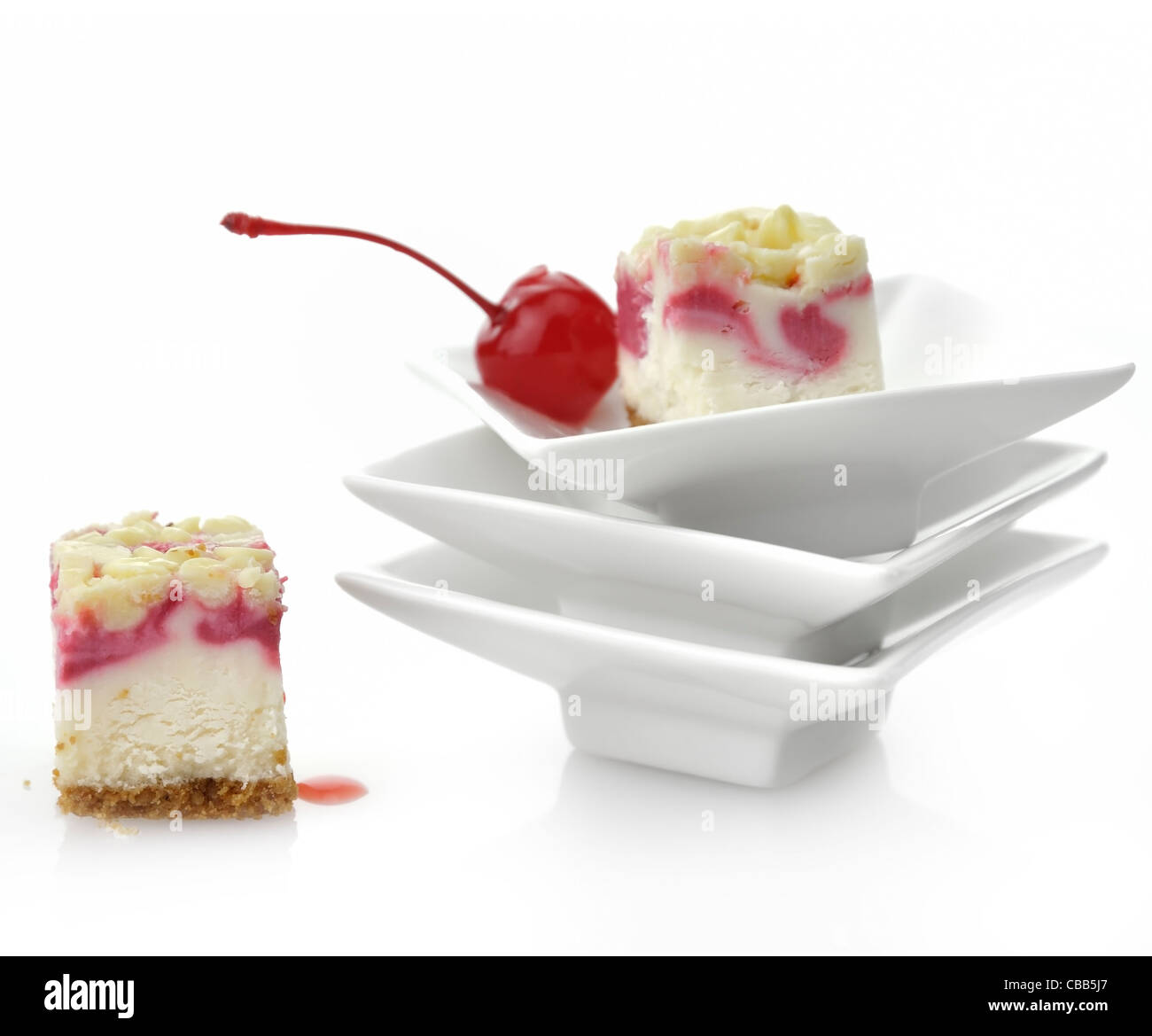 Raspberry Cheesecake Slices On White Background, Close Up Stock Photo ...