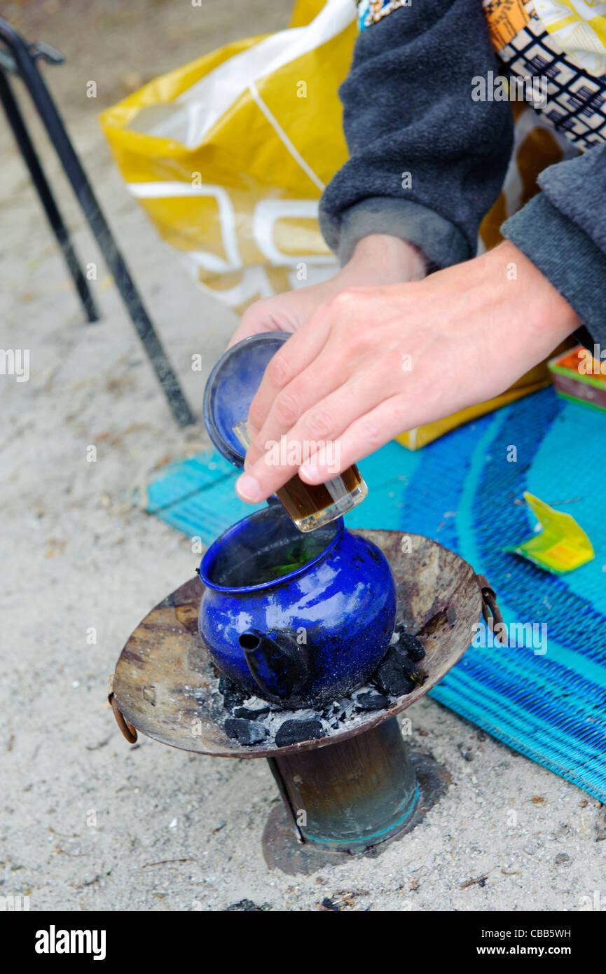 Stock photo of a man brewing tea using the traditional method Stock ...