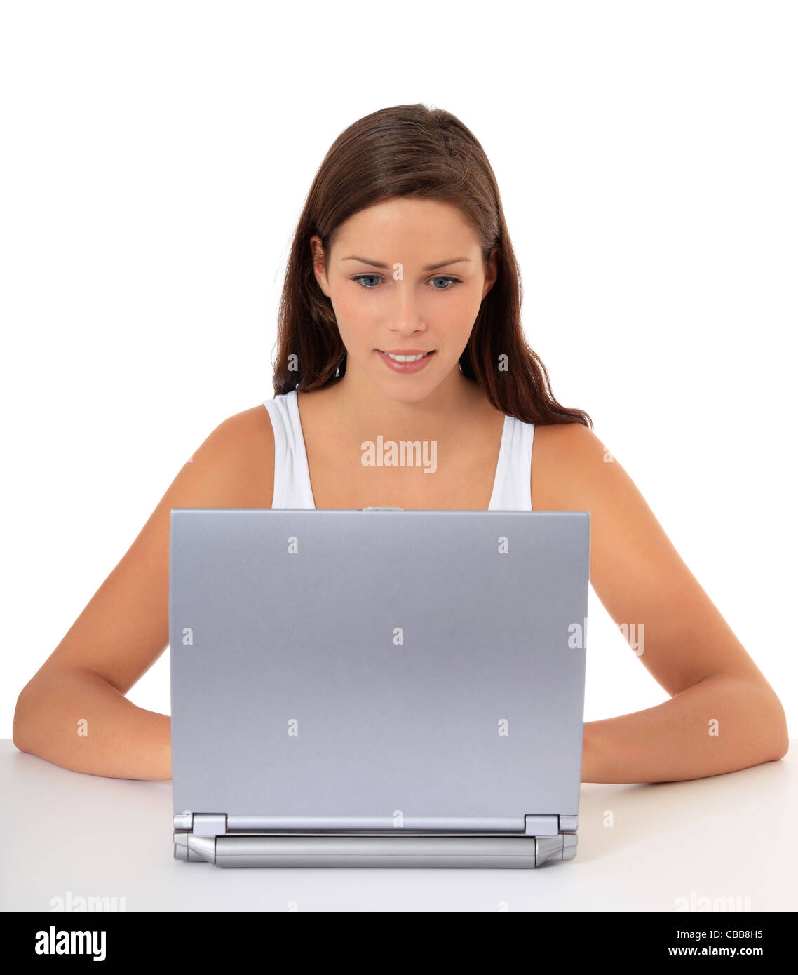 Attractive young woman surfing the internet. All on white background ...