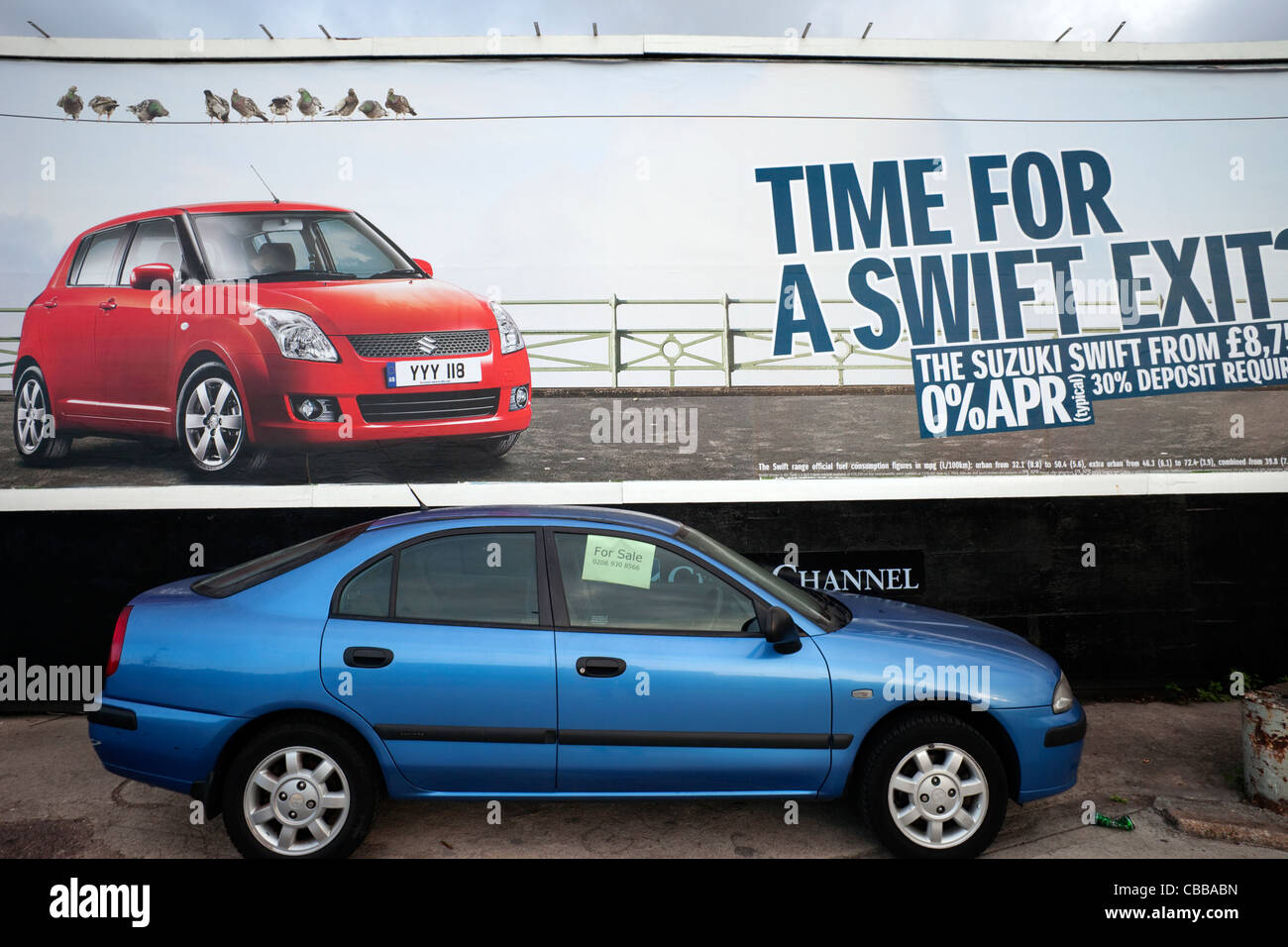 England, New Car Advertising Billboard and Parked Car for Sale Stock ...