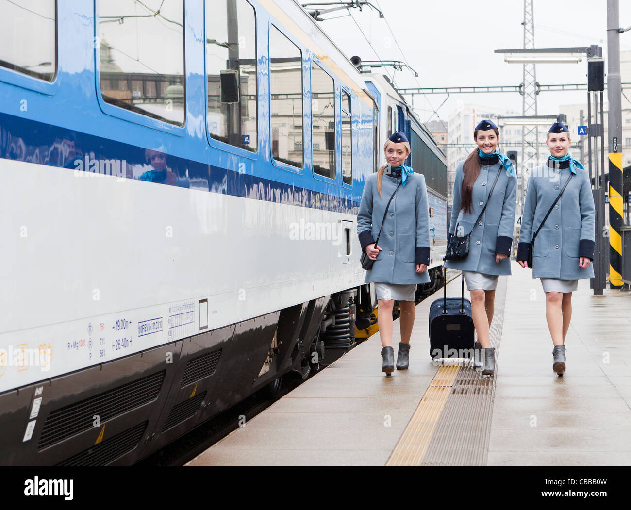 Hostess infront of reconstructed air conditioned 1st class wagon of the ...