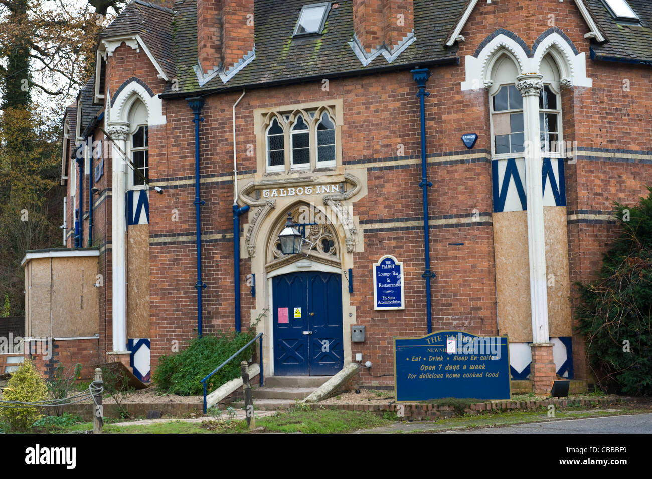The Talbot Inn boarded up local rural country pub in a High Gothic ...
