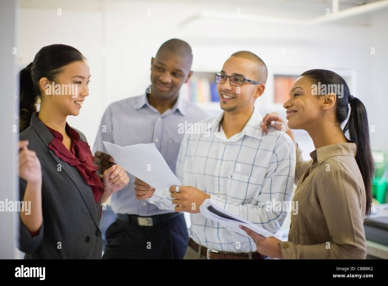 Business people talking in office Stock Photo - Alamy