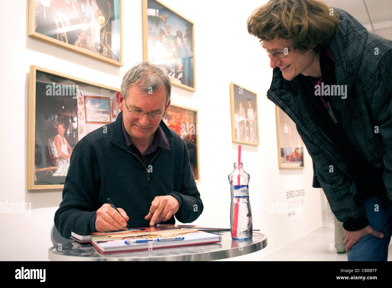 British photographer Martin Parr signs one of his books after his talk ...