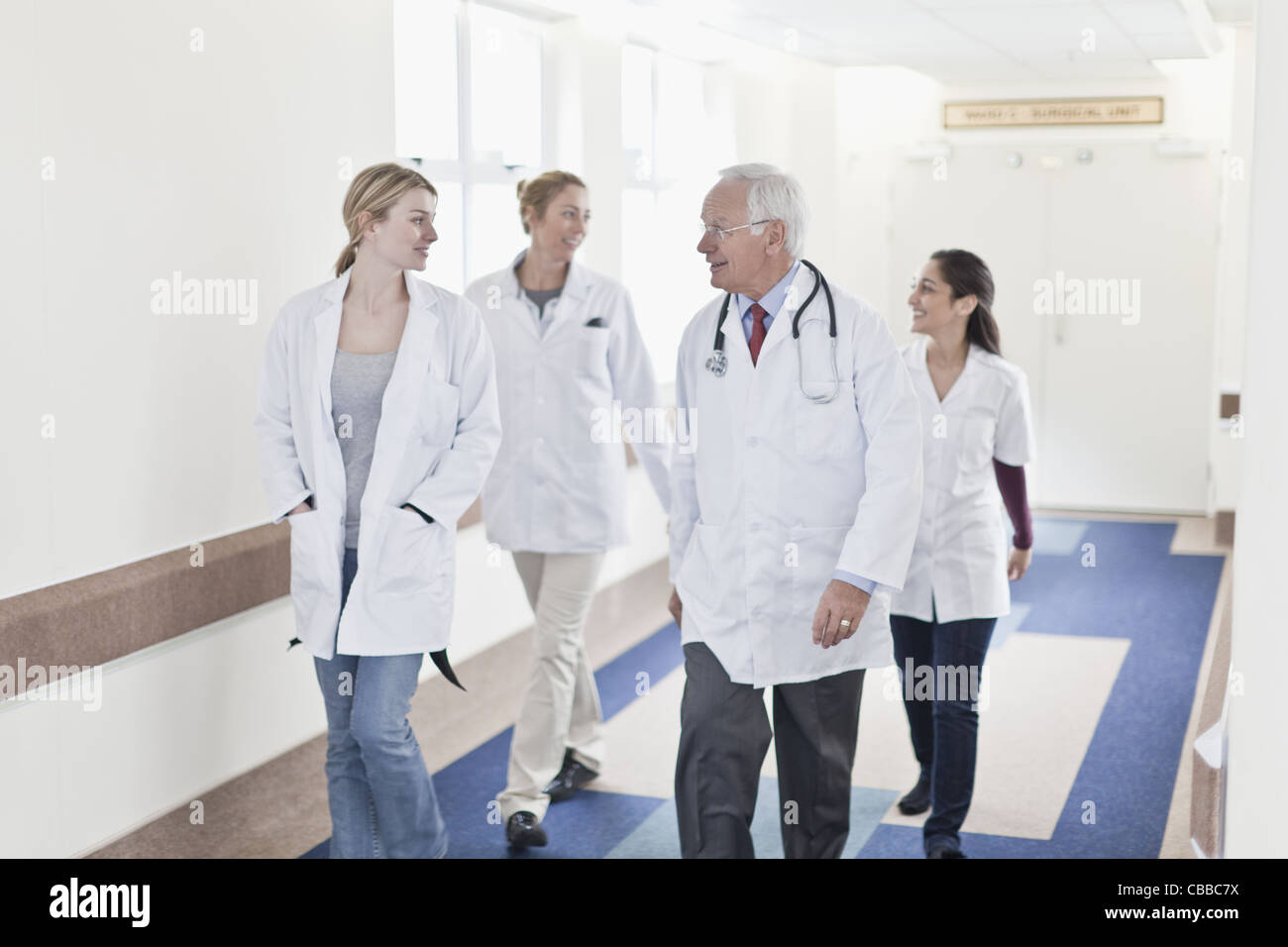 Doctors walking together in hospital Stock Photo - Alamy