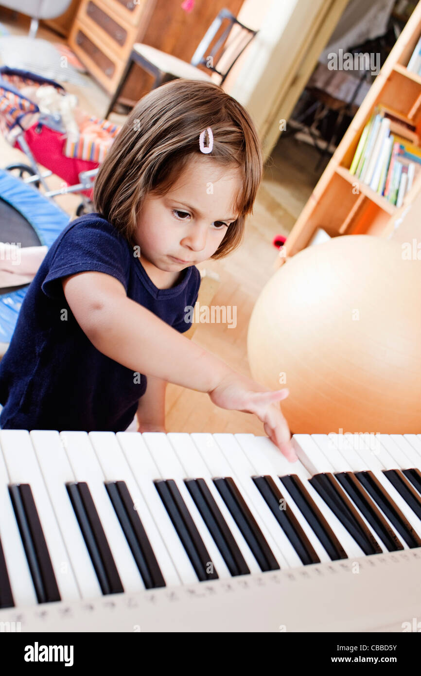child, baby, girl, childhood, keyboard, keys, key lever Stock Photo - Alamy