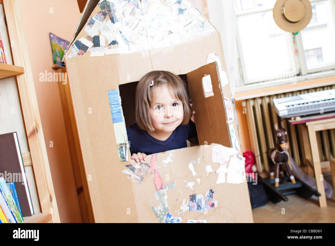 child, baby, girl, childhood, paper box, house Stock Photo - Alamy