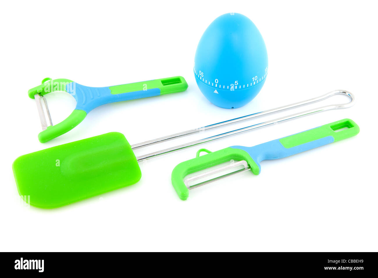 Couple of colorful kitchen utensils over white background Stock Photo ...