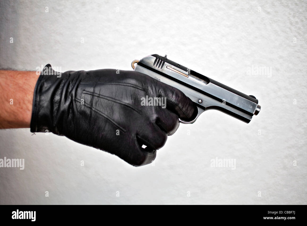 Pointed gun hi-res stock photography and images - Alamy