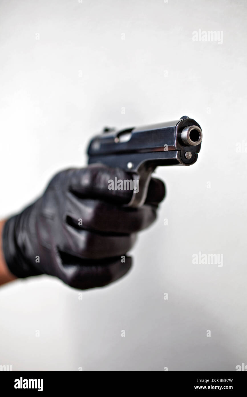 Pointed gun hi-res stock photography and images - Alamy