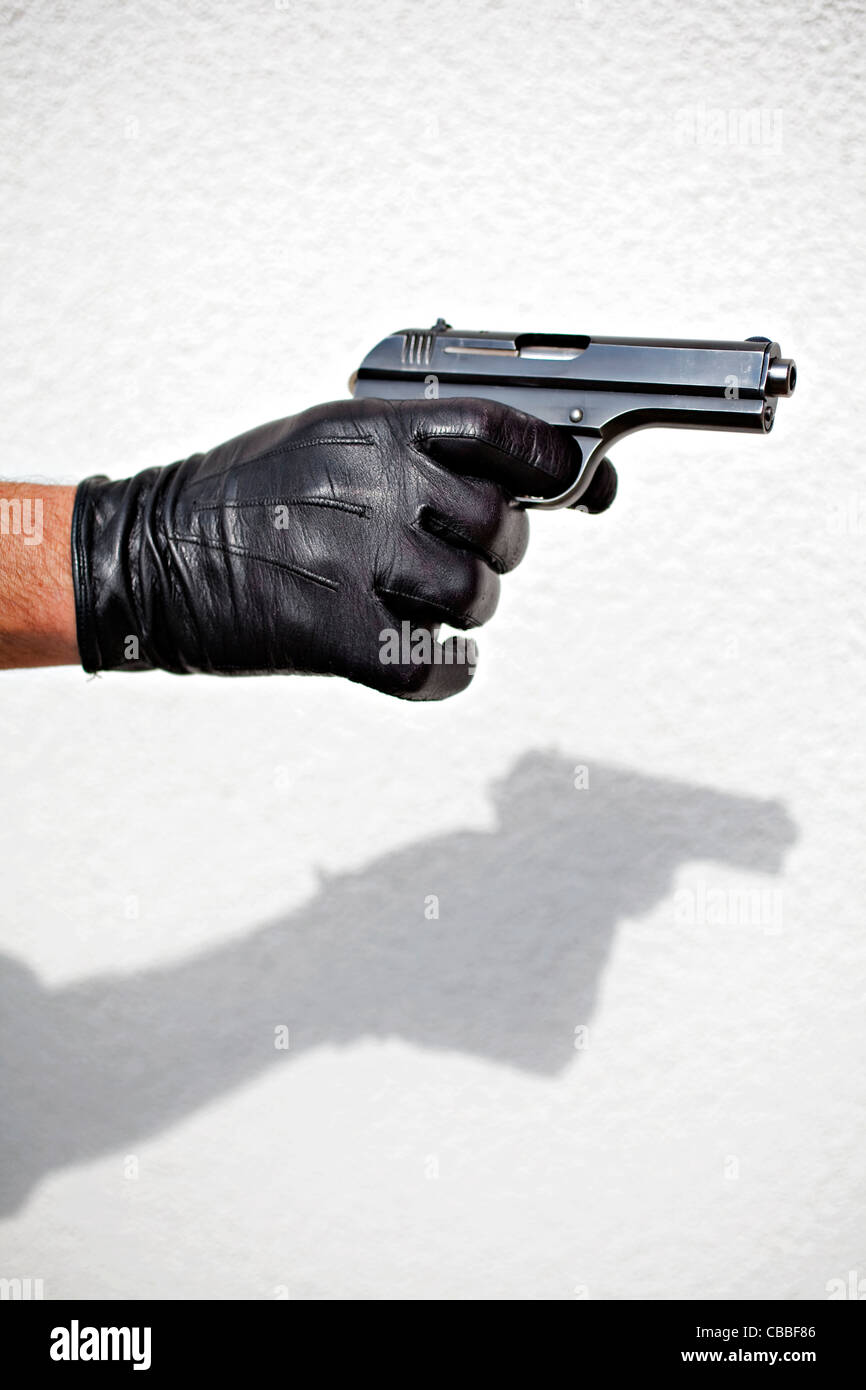 Pointed gun hi-res stock photography and images - Alamy