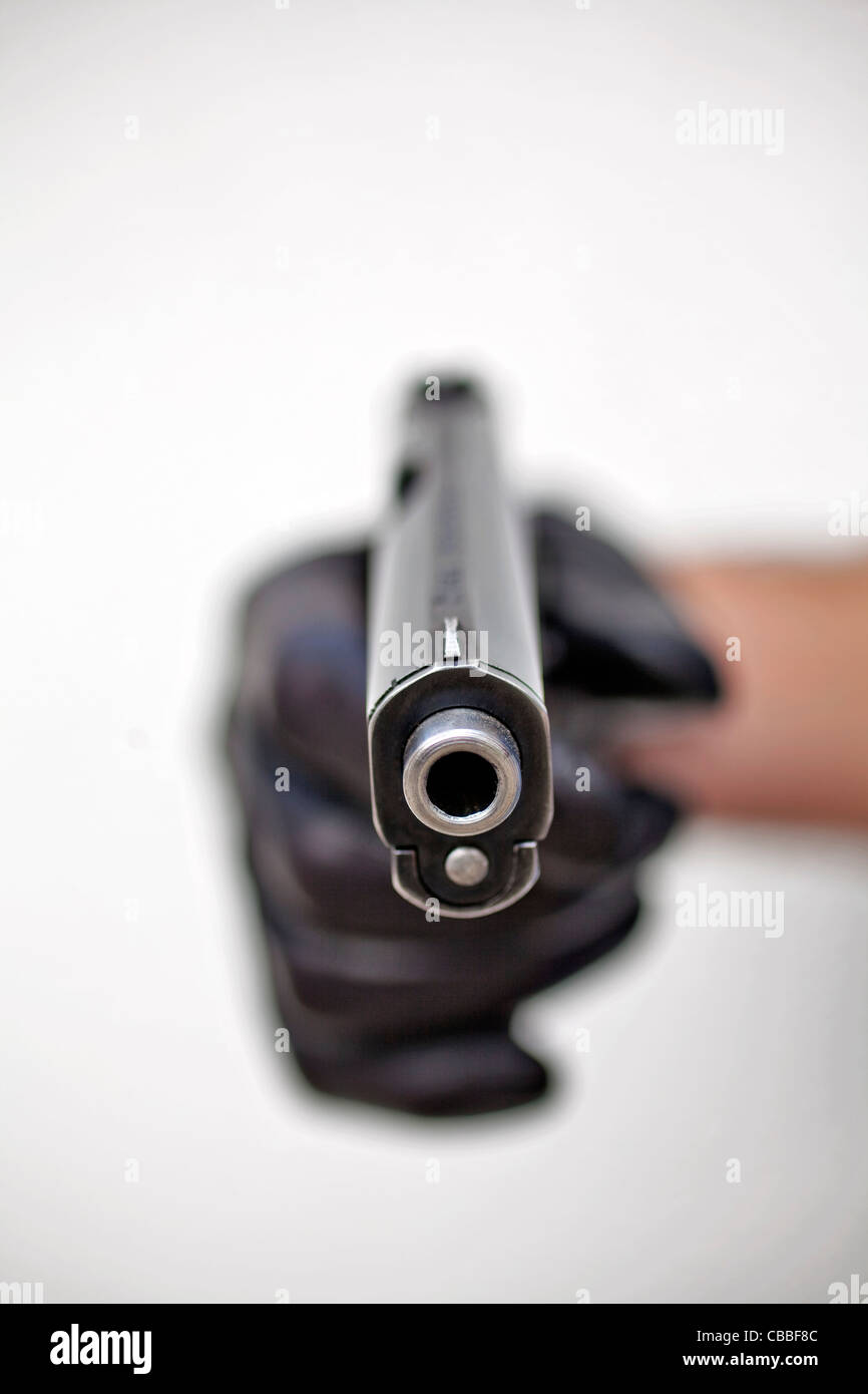 Pointed gun hi-res stock photography and images - Alamy