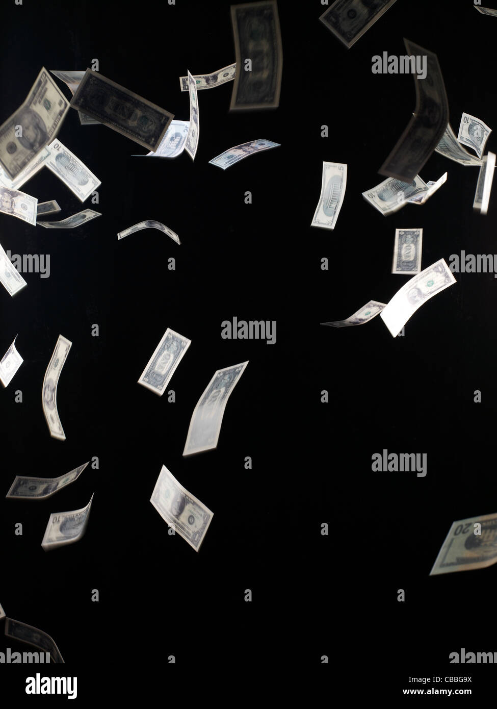 Money falling hi-res stock photography and images - Alamy