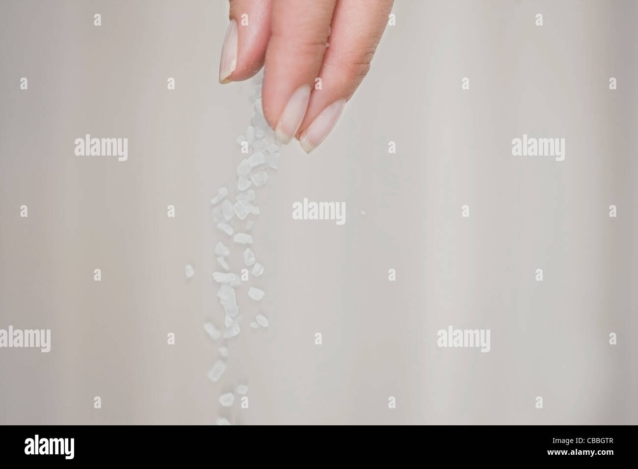Hand sprinkling salt hi-res stock photography and images - Alamy