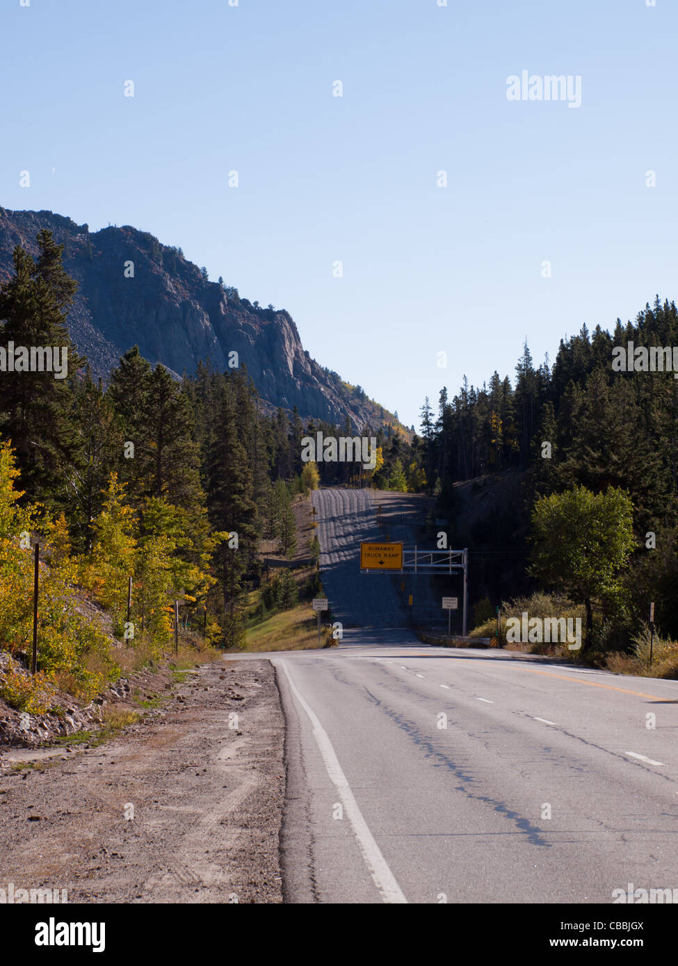 Brilliant fall colors adorn a country road in Colorado Stock Photo - Alamy