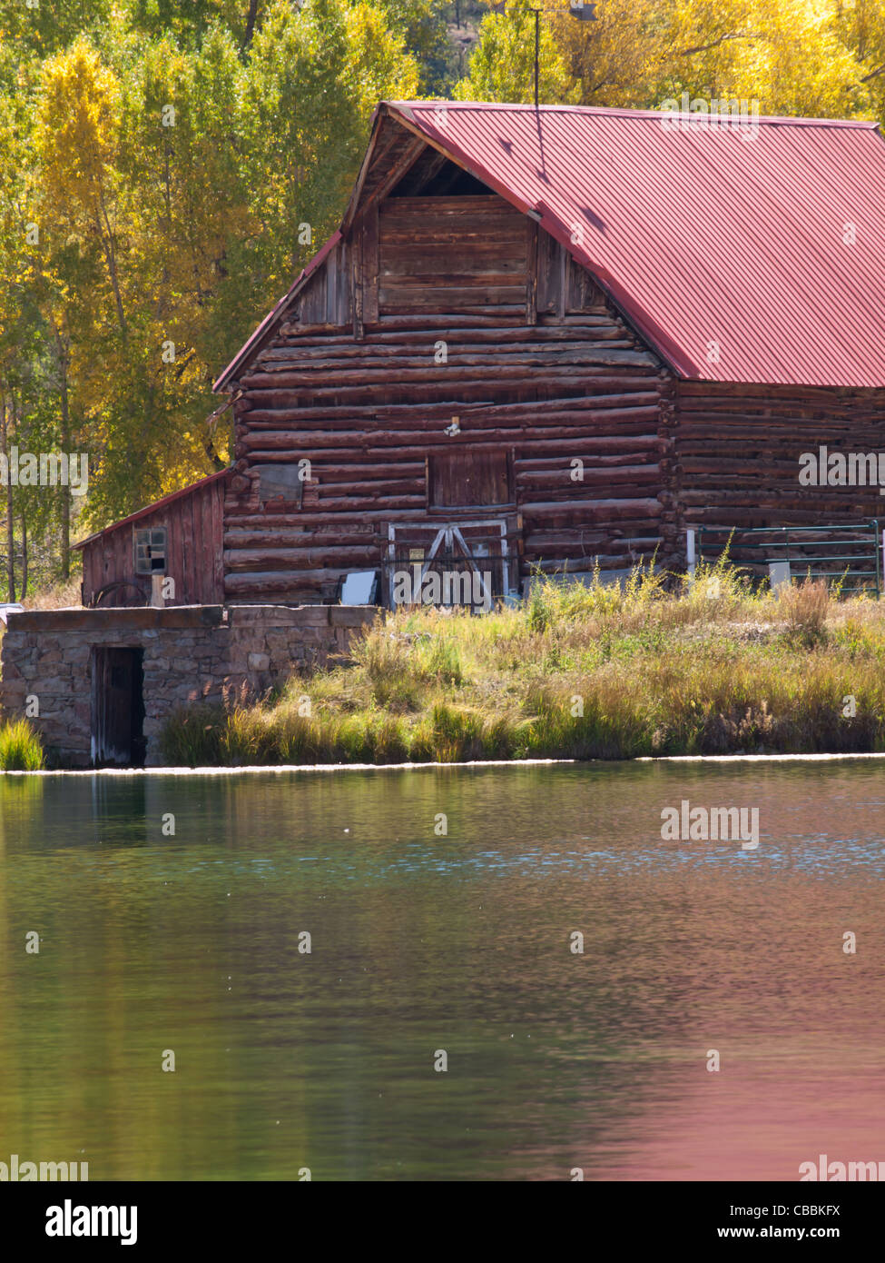 Old barn by the lake in autumn. Near Lake City, Colorado Stock Photo ...