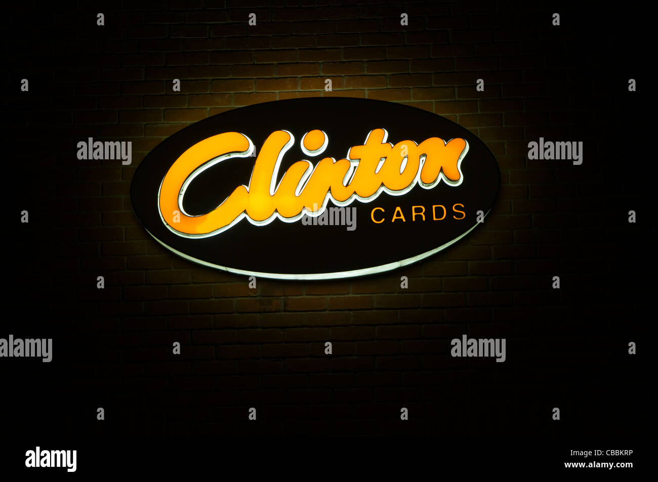 A neon sign advertising Clinton Cards Stock Photo - Alamy