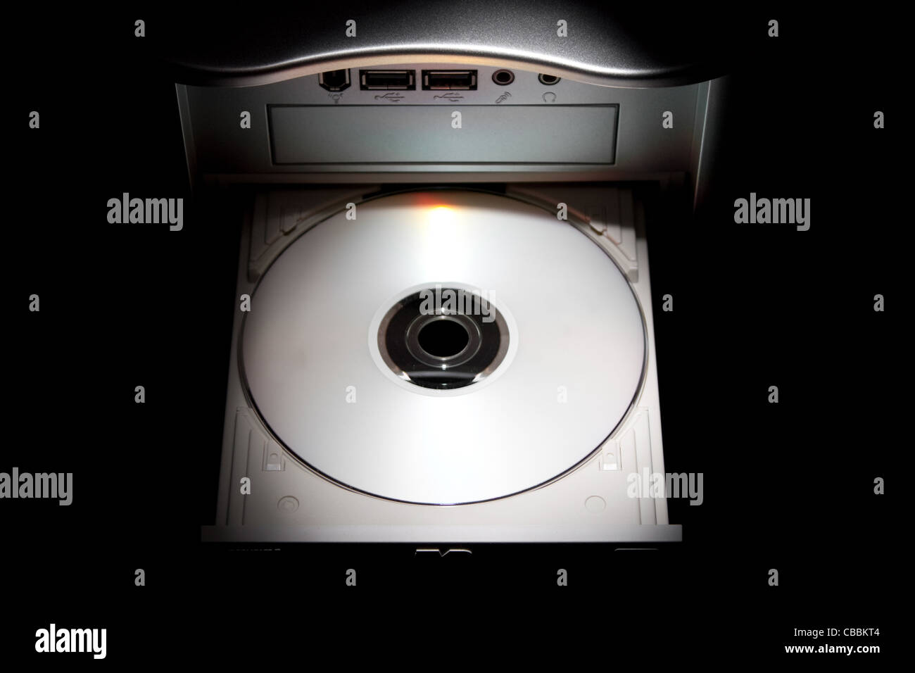 computer disk drive loaded with disk and isolated on white Stock Photo ...