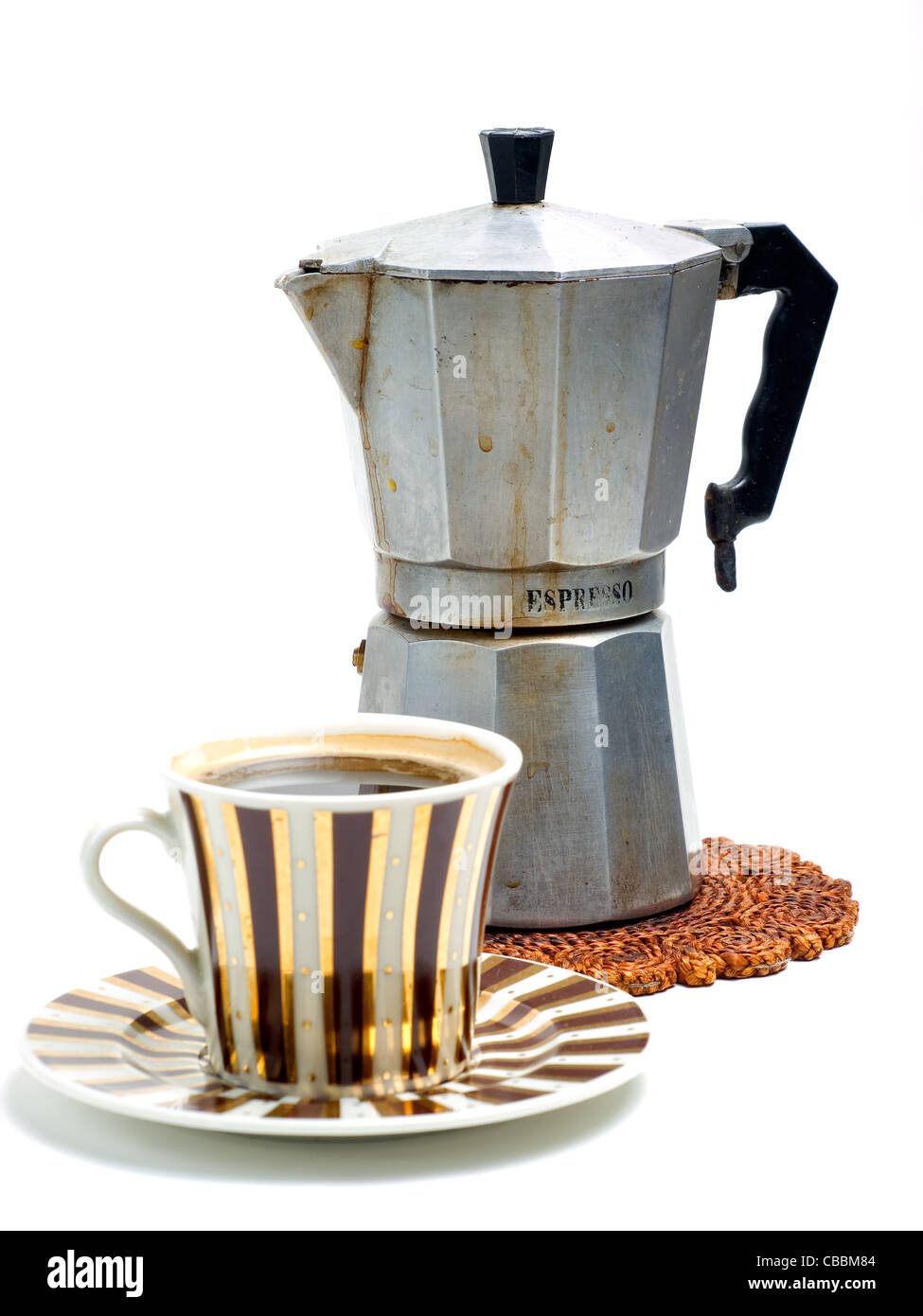 Cup full of black coffee and coffee cooker on a white background Stock ...